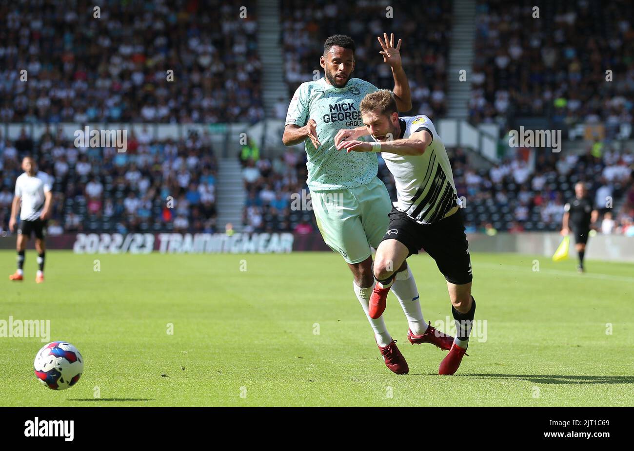 Derby County’s Tom Barkhuizen (right) and Peterborough United’s Nathan ...