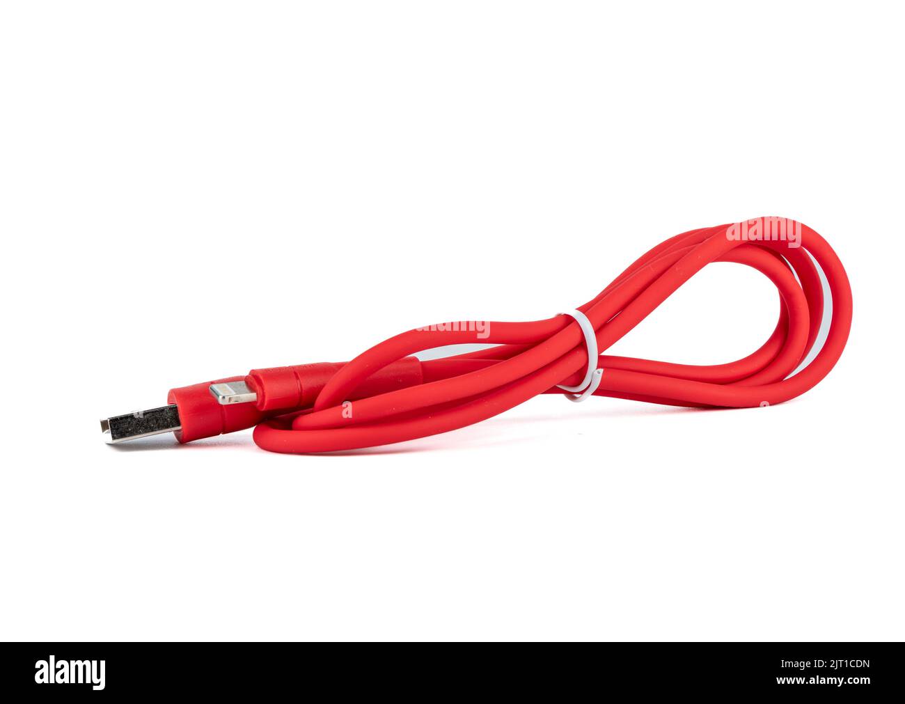Red cable with USB and mini-USB connectors on a white background. Copy ...