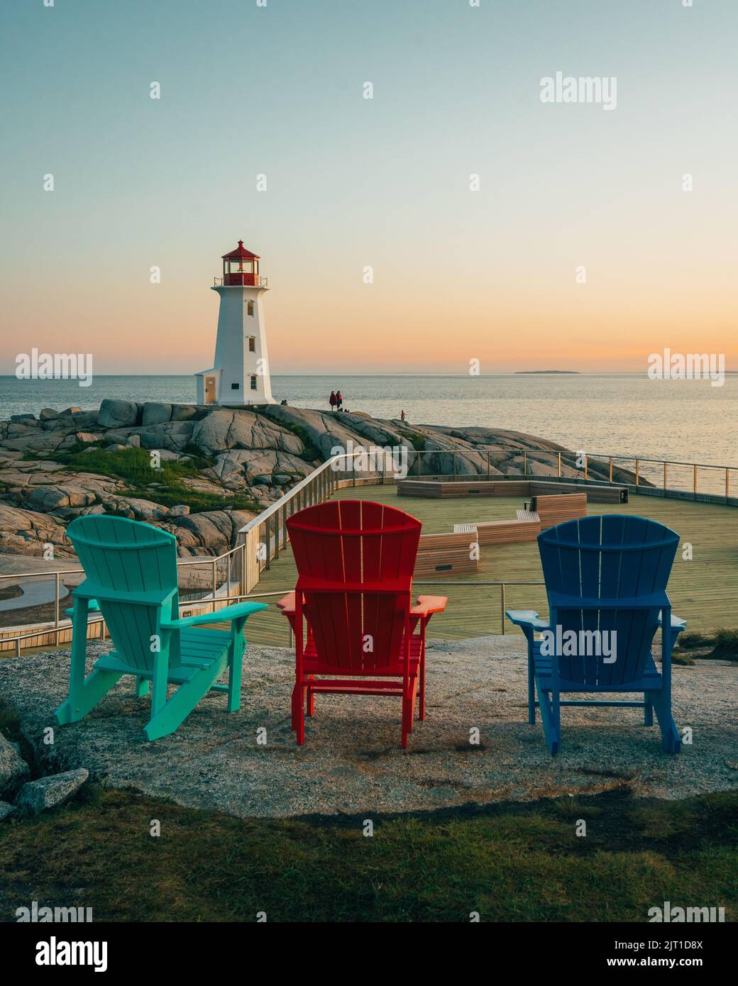 Peggys Cove Lighthouse with Adirondack chairs at sunset, Peggys Cove ...