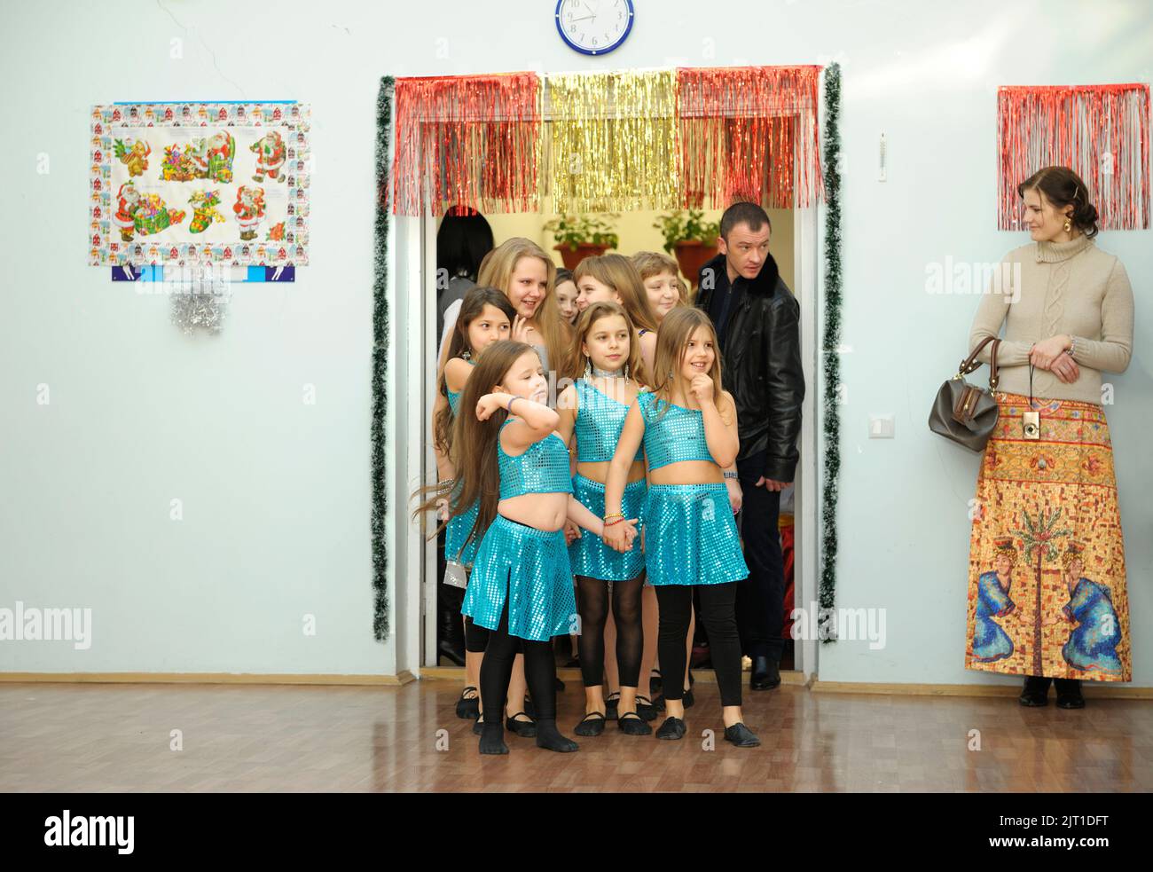 Children in carnival costumes singing song in the kindergarten, New ...