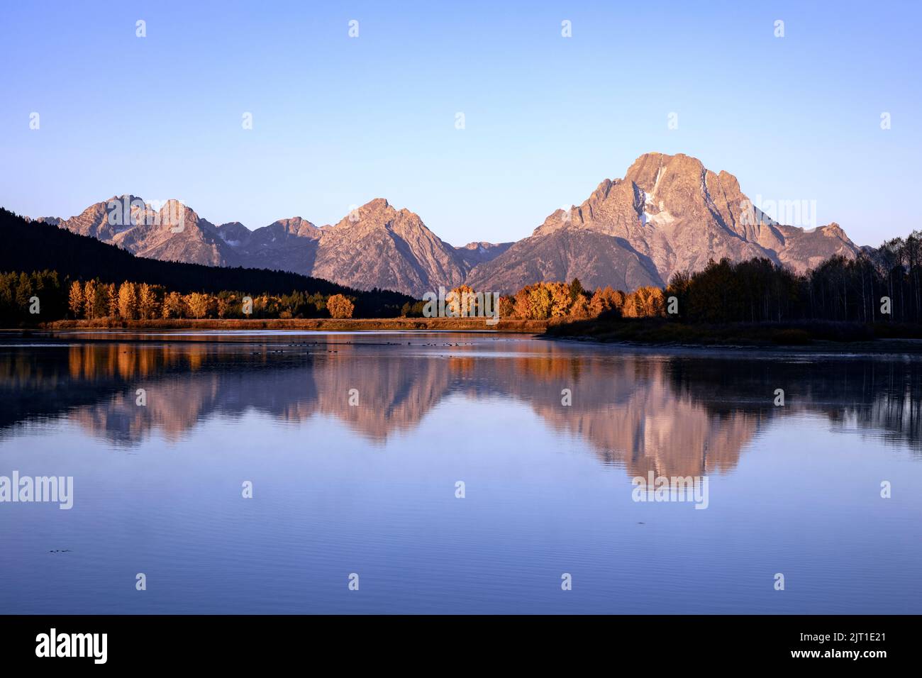 WY05021-00....WYOMING - Sunrise at Oxbow Bend of the Snake River in ...