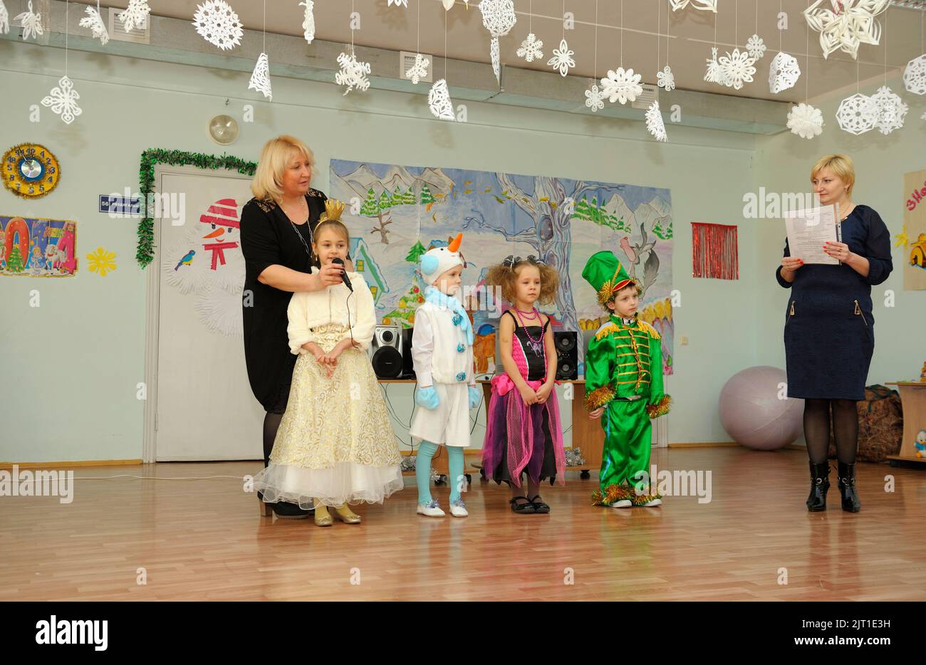 Children in carnival costumes performing in the kindergarten during New ...