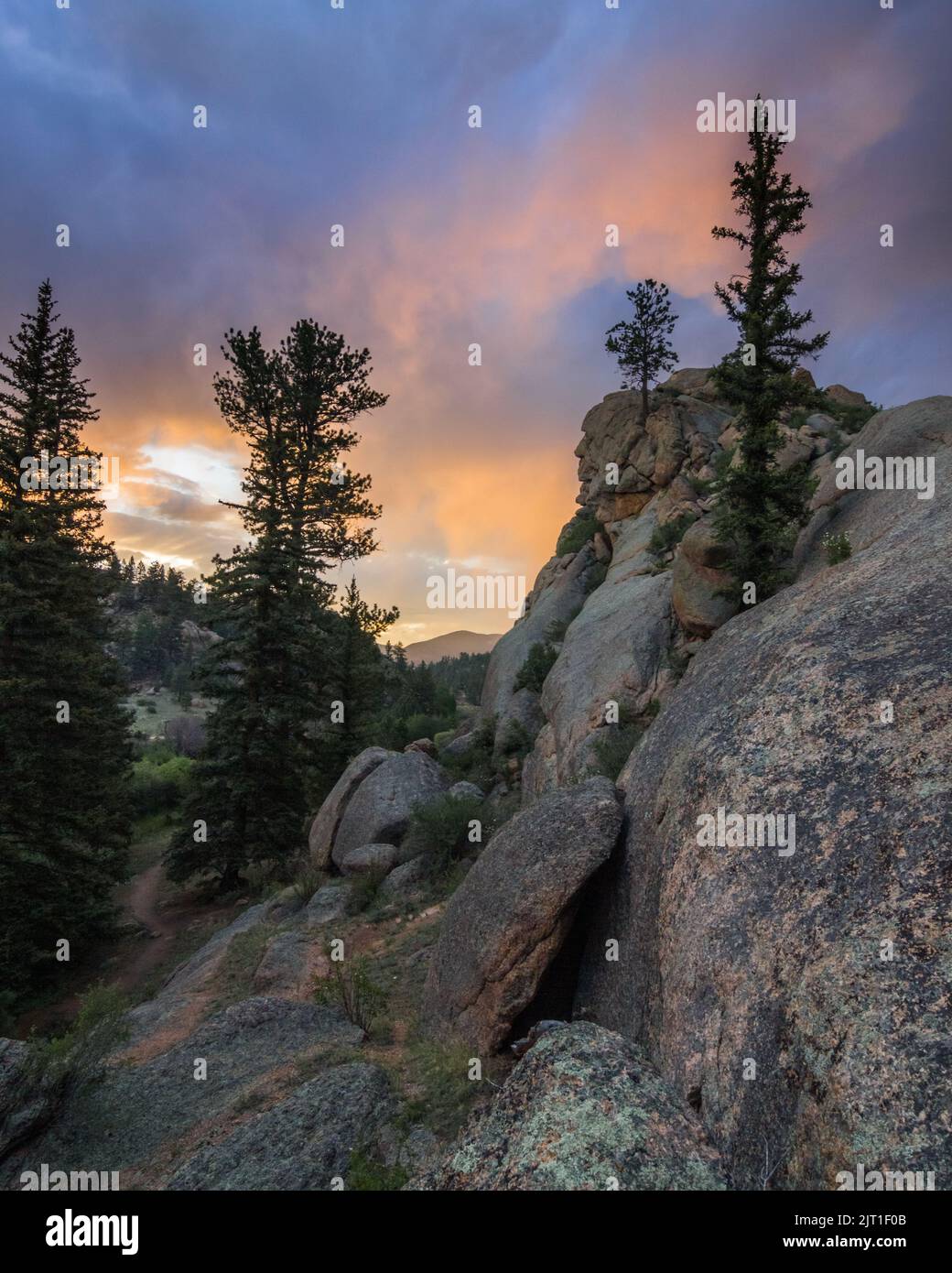 A face of granite overlooks the remnants of a fiery sunset in the ...