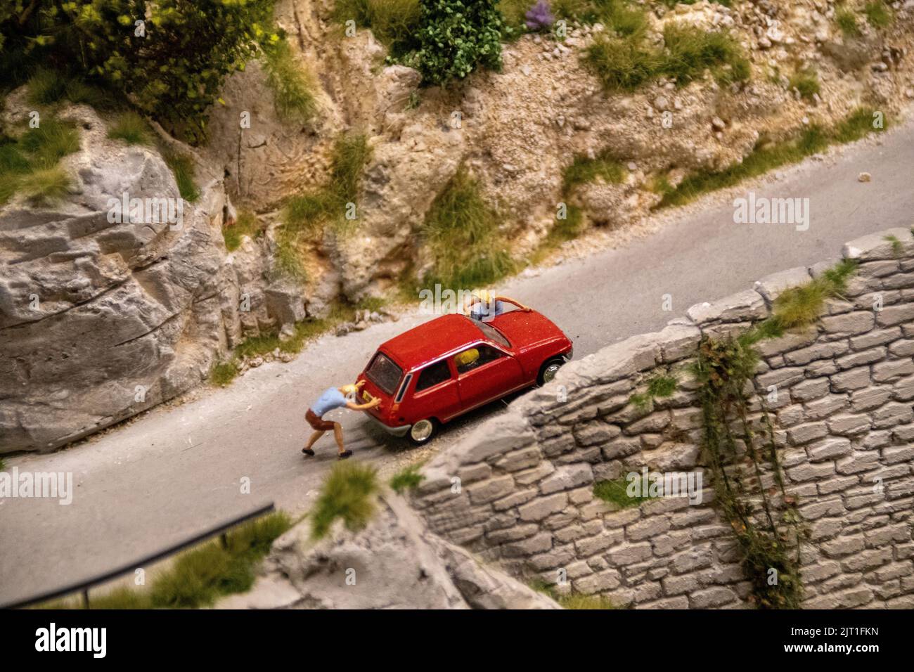 Pushing a car uphill hi-res stock photography and images - Alamy