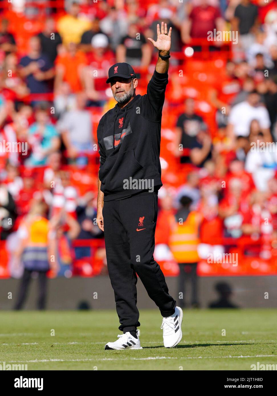 Liverpool manager Jurgen Klopp waves to the fans at the end of the ...