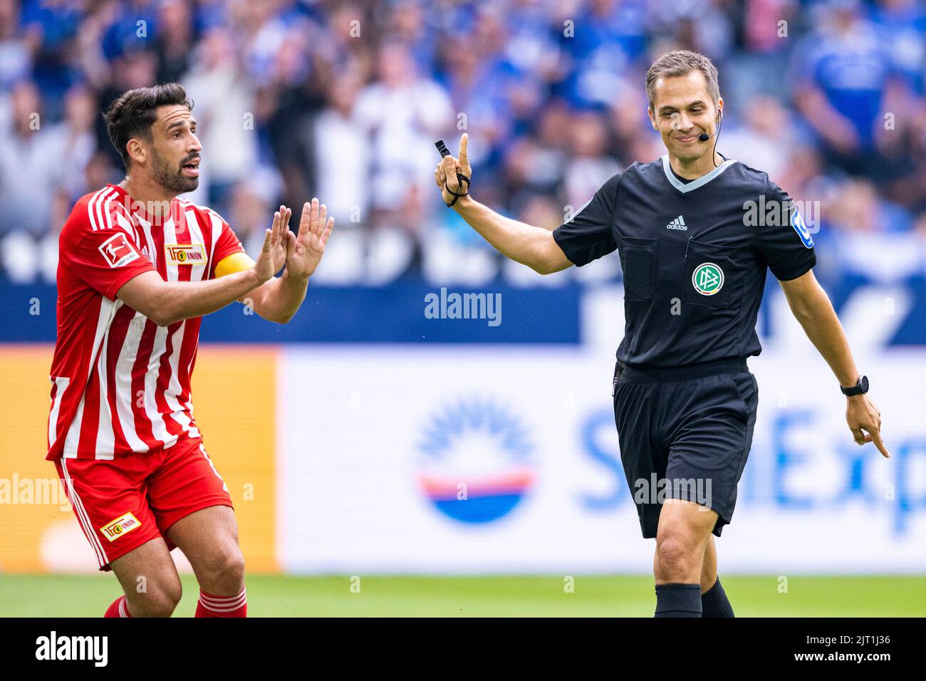 Referee robert hartmann with whistle hi-res stock photography and ...