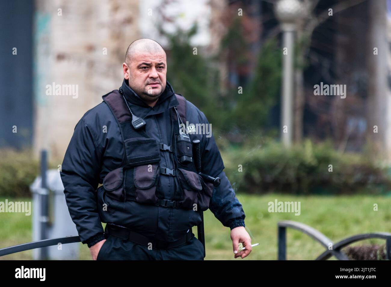 People and tourists wander the streets of the Bucharest Old Town ...
