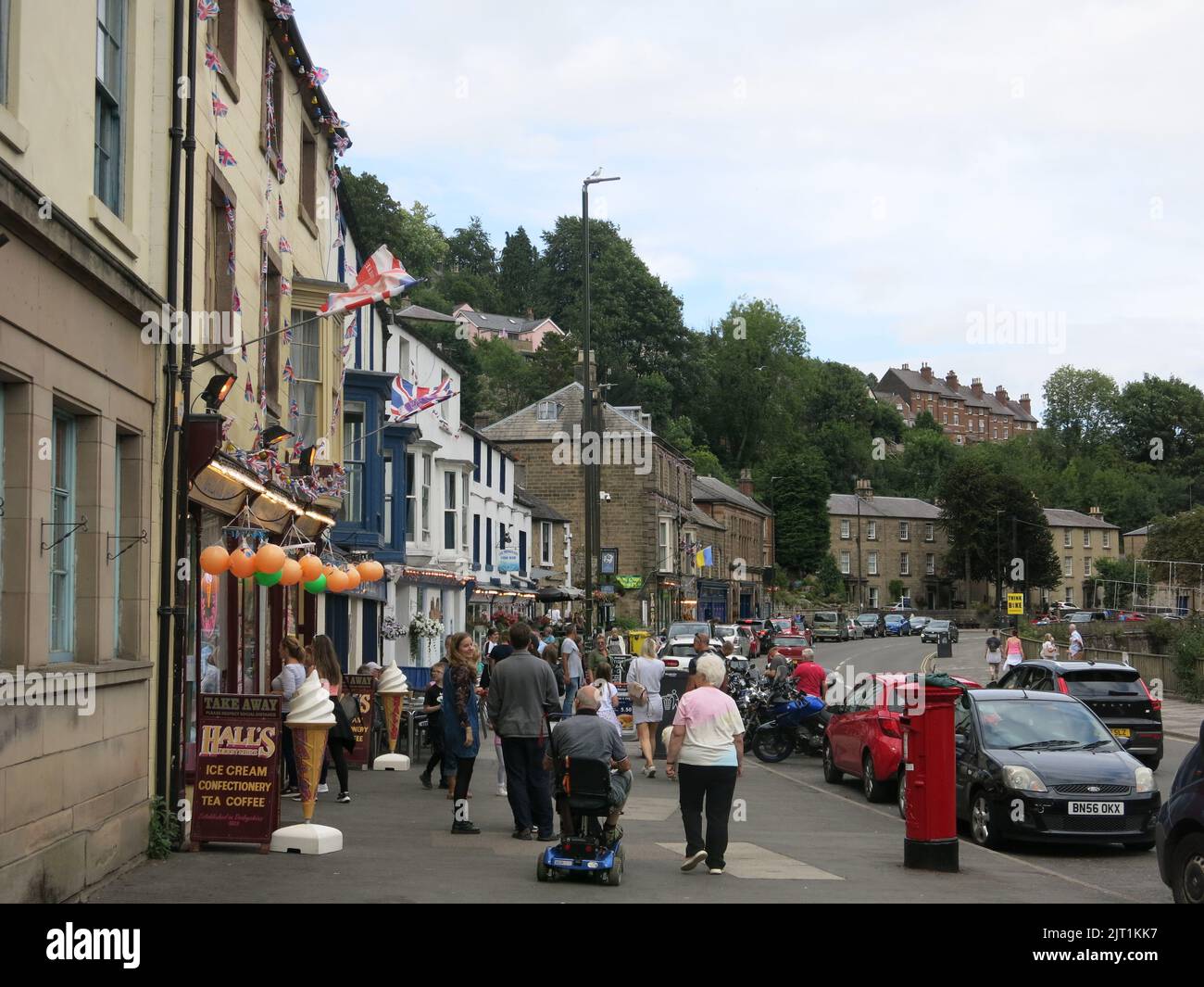 A busy street scene on North Parade in Matlock Bath, where tourists ...