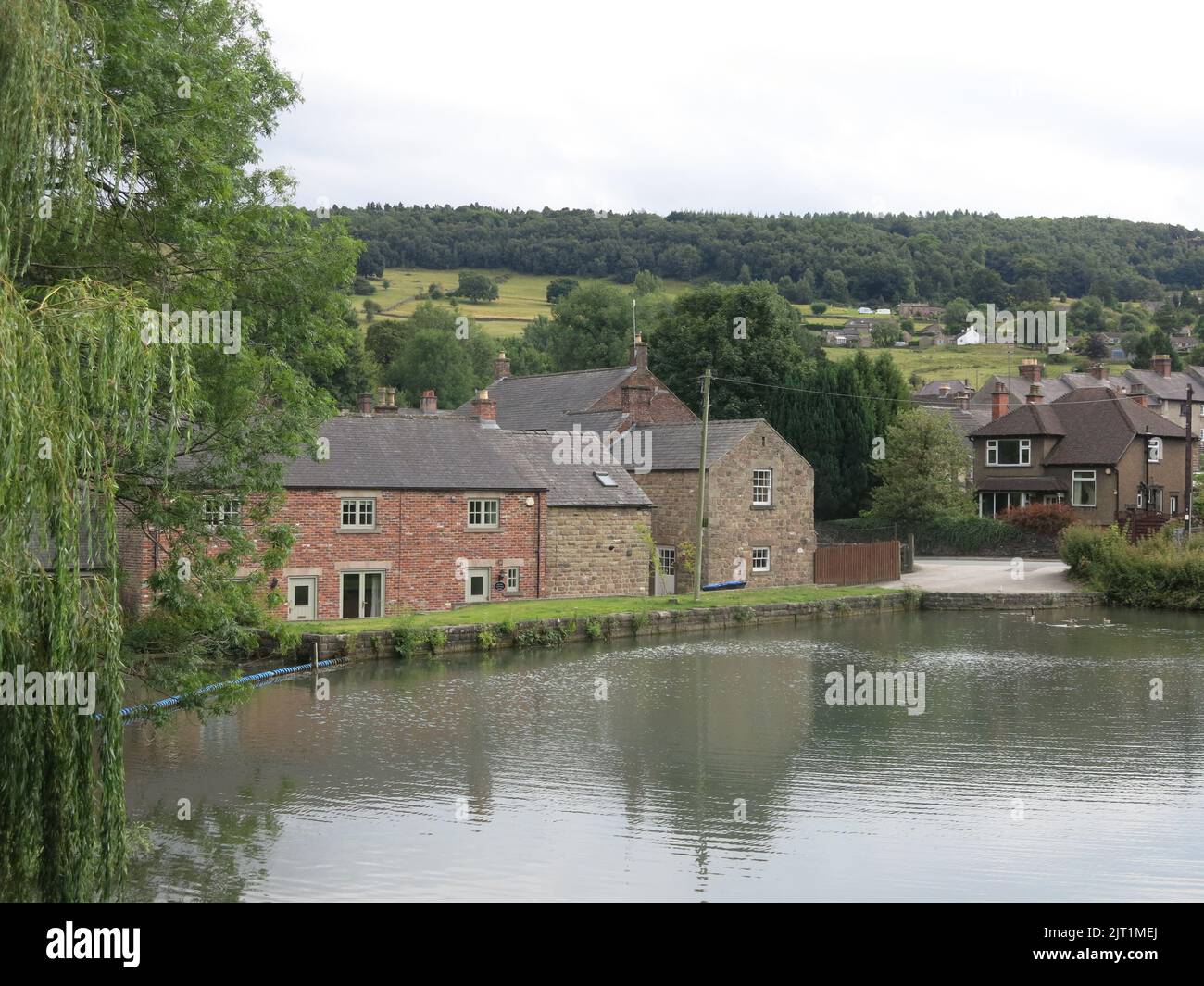 View over Greyhound Pond in the village of Cromford, the northern ...