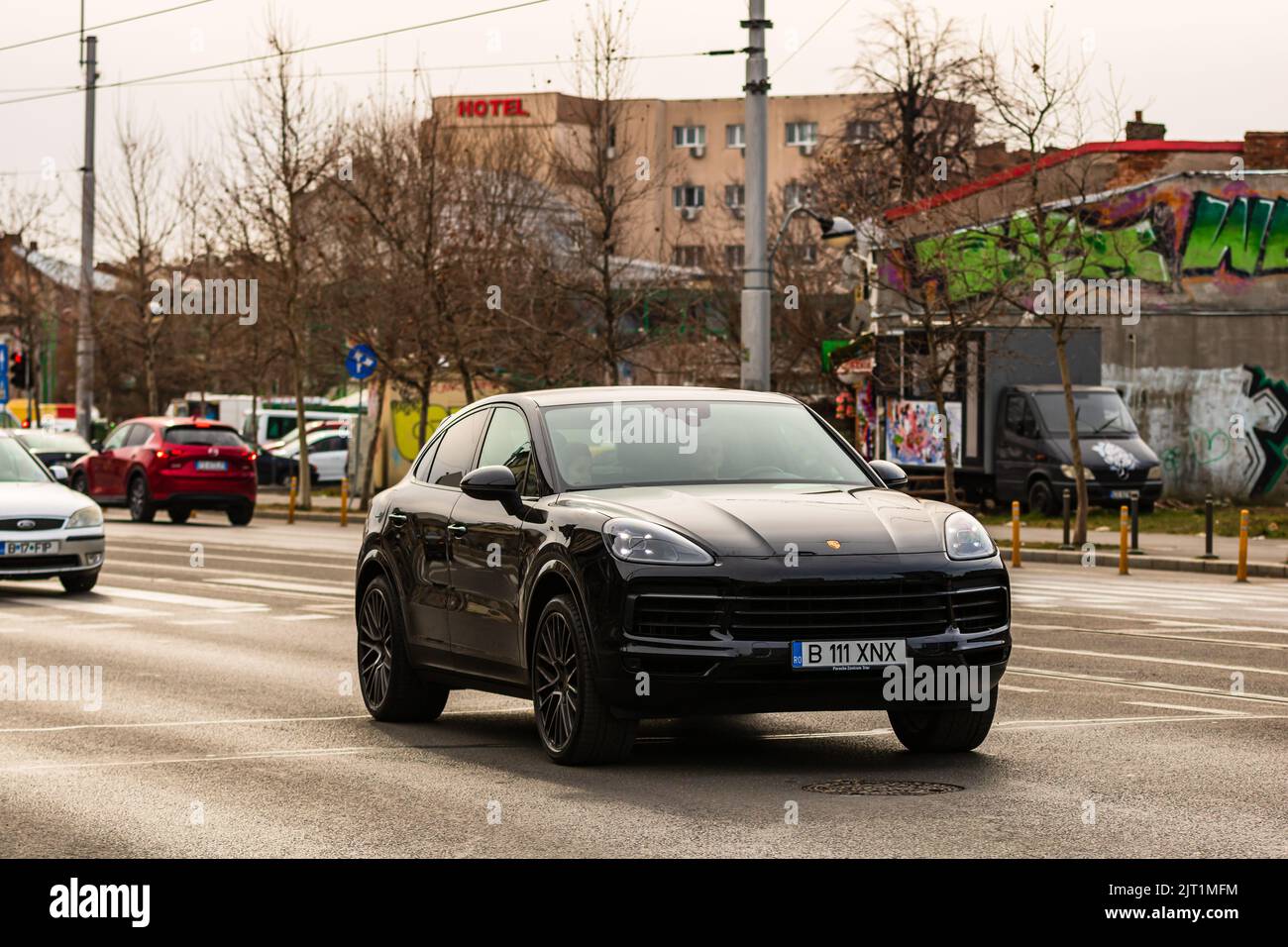 Porsche luxury car in traffic in Bucharest, Romania, 2022 Stock Photo ...