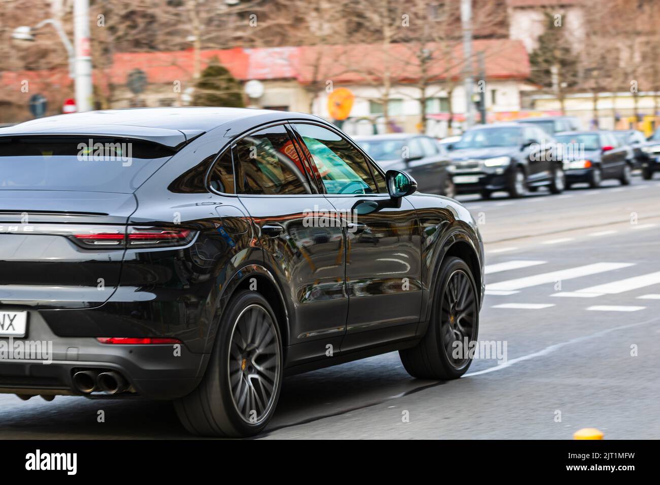 Porsche luxury car in traffic in Bucharest, Romania, 2022 Stock Photo ...
