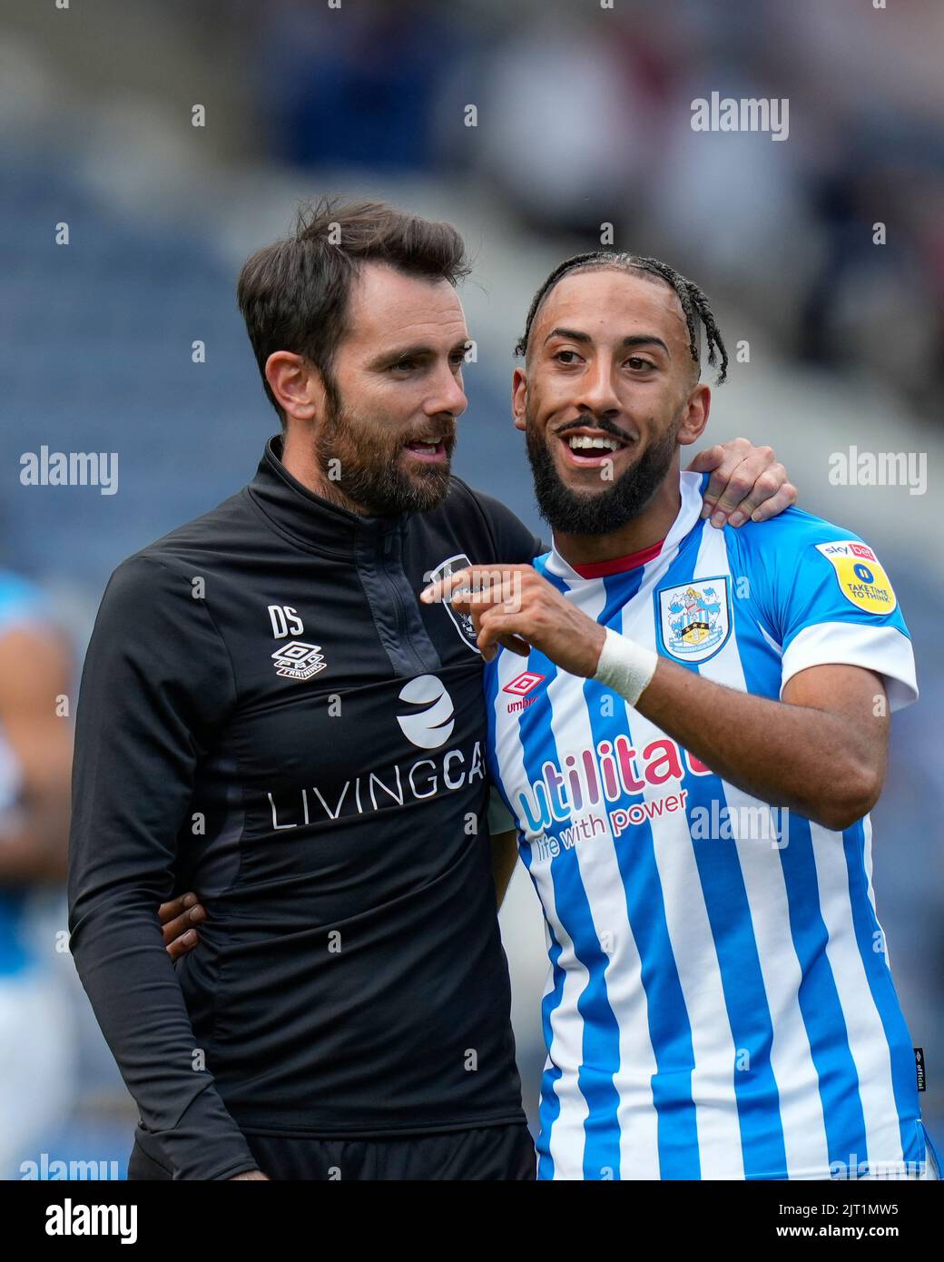 Danny Schofield manager of Huddersfield Town speaks with Sorba Thomas ...