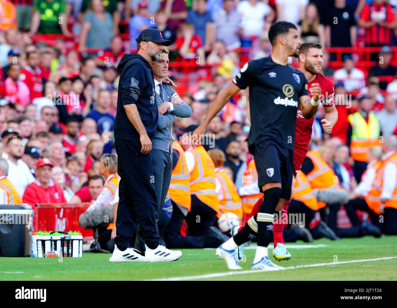 Liverpool manager Jurgen Klopp (left) hugs Bournemouth manager Scott ...