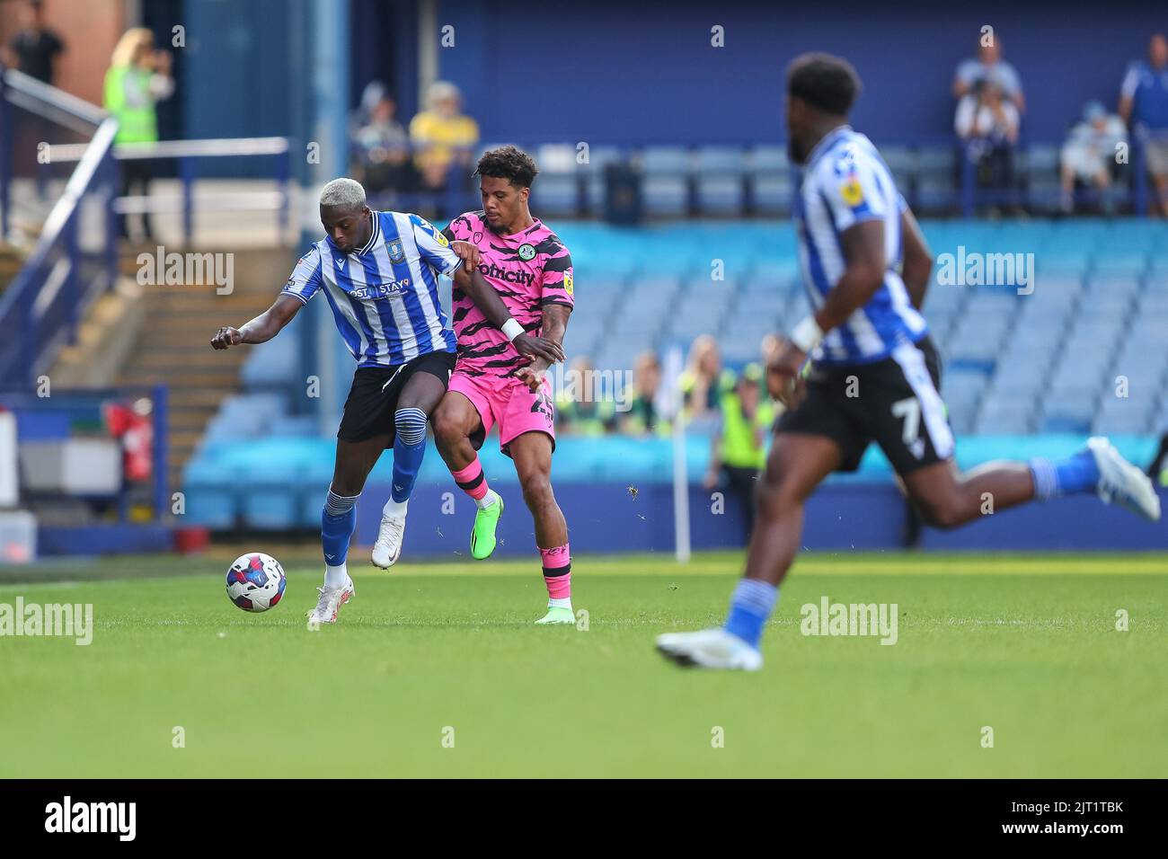 Dominic Iorfa #6 of Sheffield Wednesday holds off Myles Peart-Harris ...