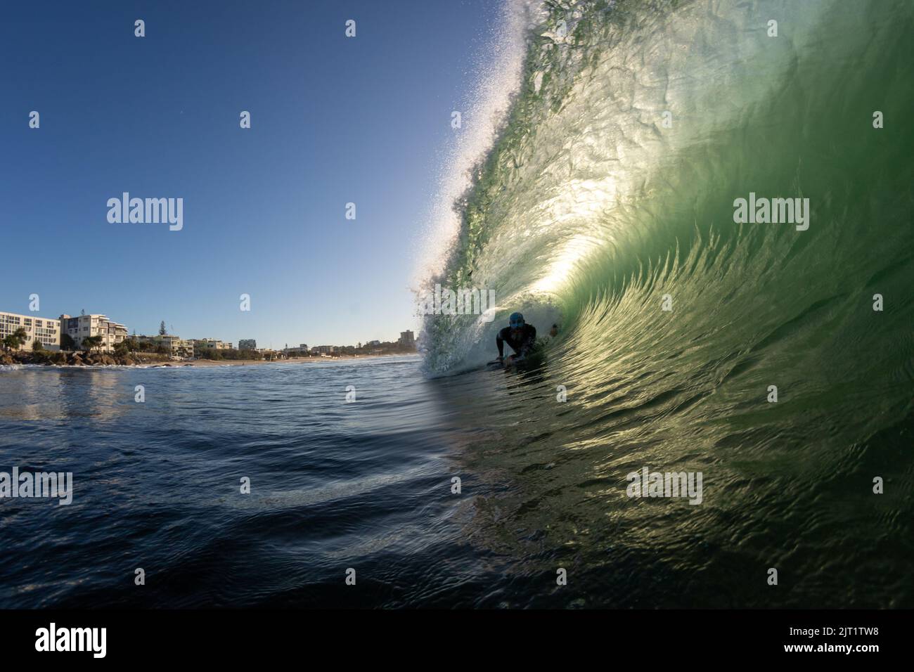 A bodyboarder in the barrel of a wave Stock Photo - Alamy