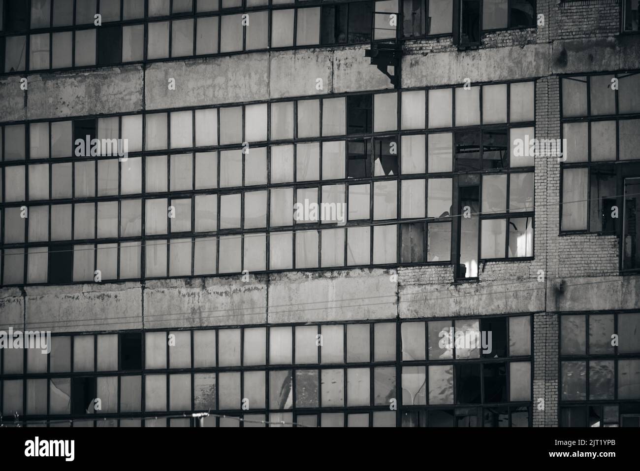 Broken glass facade old, industrial, abandoned factory building Stock ...