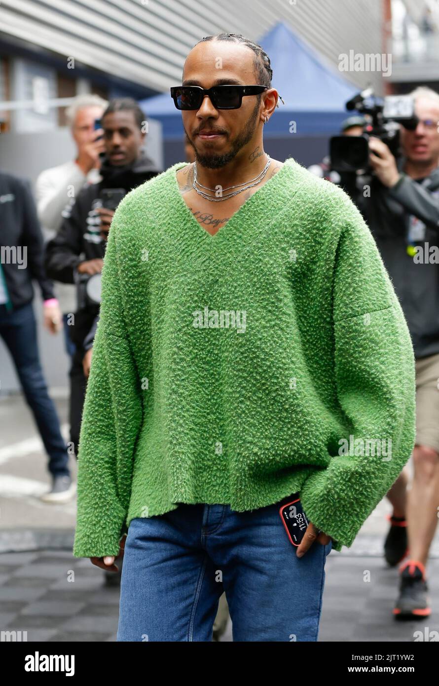 Lewis hamilton arrives in the paddock hi-res stock photography and ...