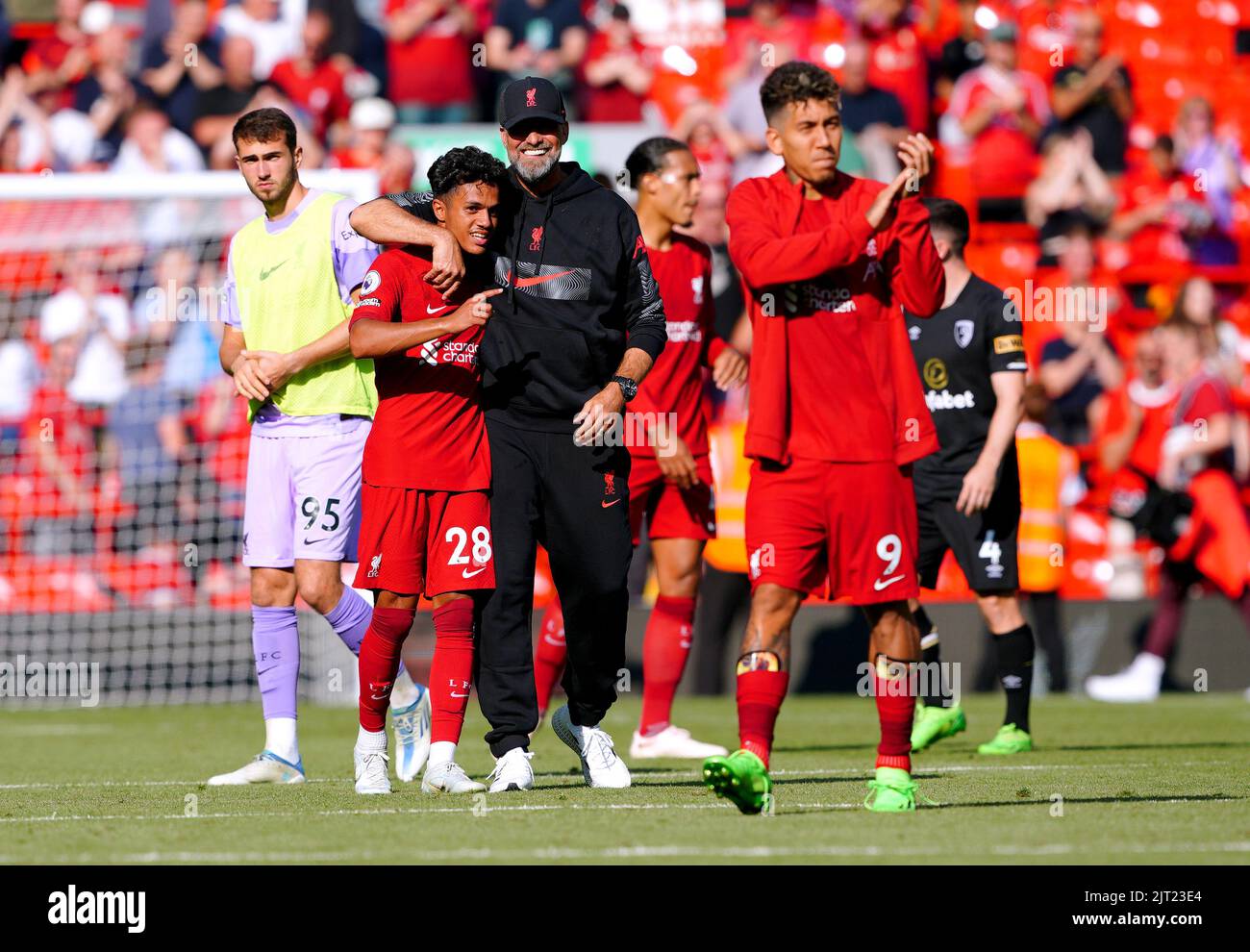 Liverpool manager Jurgen Klopp hugs Fabio Carvalho at the end of the ...
