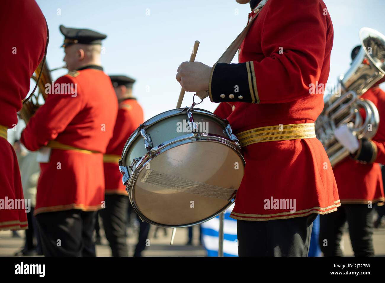 Drummer at parade in red clothes. Drumming. Percussion musical ...