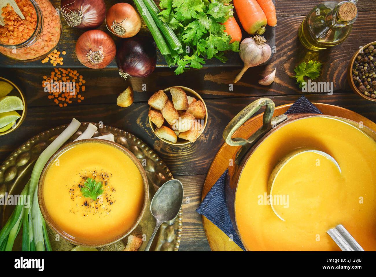 Arabic Cuisine; Middle Eastern traditional red lentil soup with fresh ...