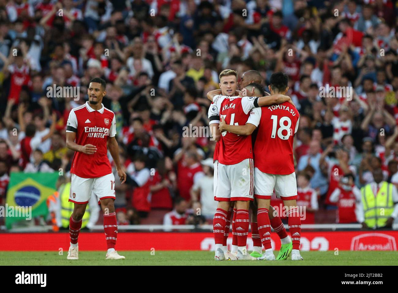Arsenal players celebrate at the final whistle Stock Photo - Alamy