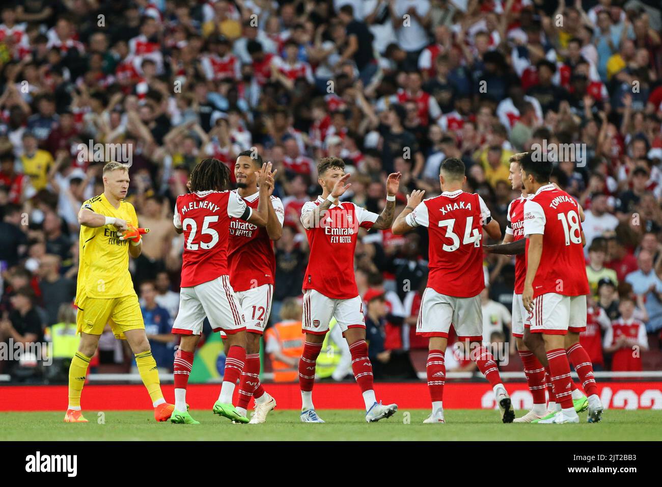 Arsenal players celebrate at the final whistle Stock Photo - Alamy