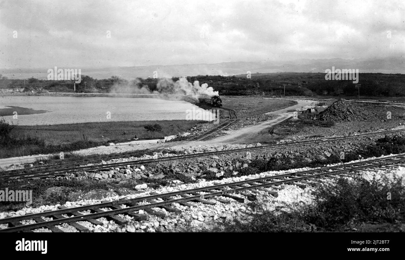 Train unloading rock at Pearl Harbor, Hawaii (USA), 24 December 1918 ...