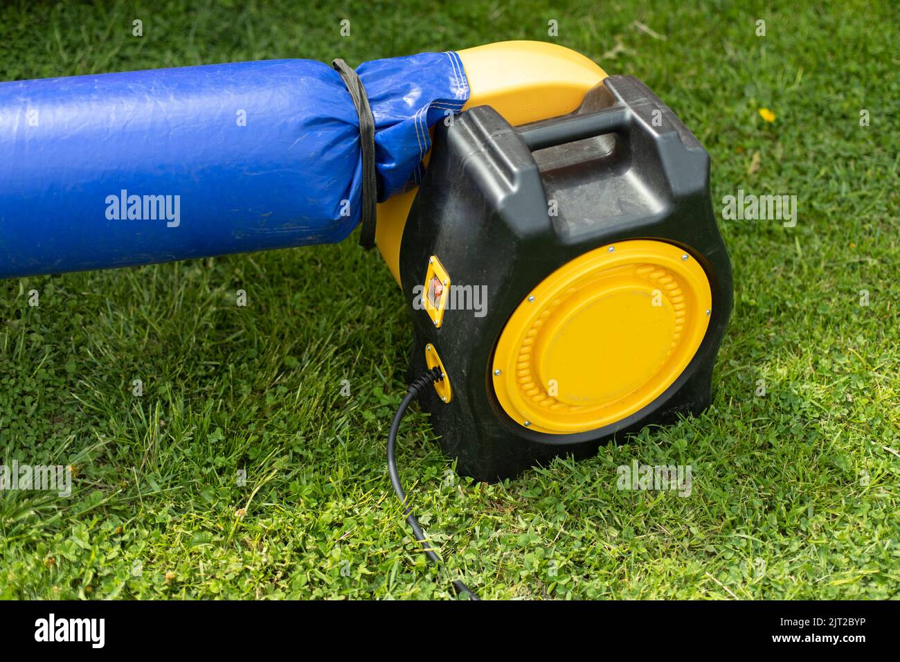 Electric trampoline pump. Air generator. Turbine on rubber casing ...