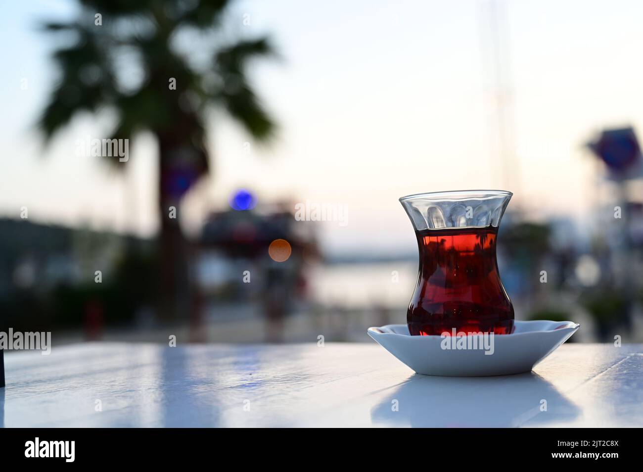 Turkish tea with bokeh background in sunset time Stock Photo - Alamy