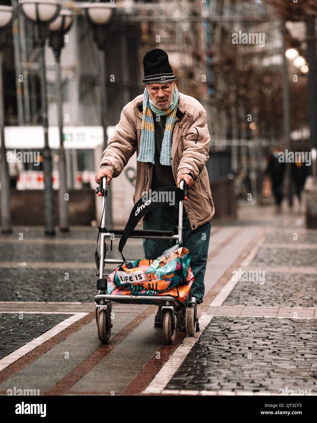 An urban life in the city with an elderly male on the street Stock ...
