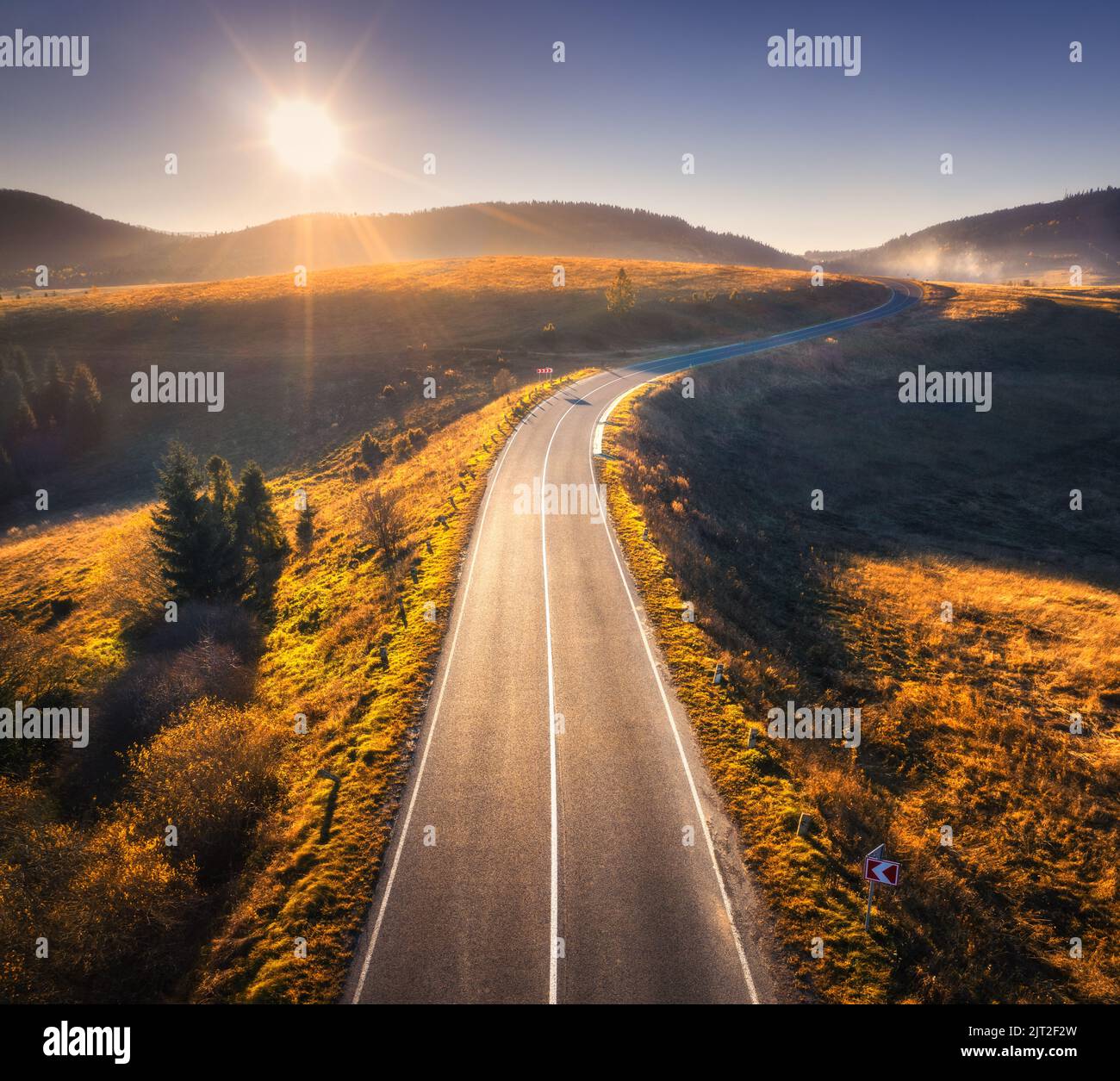 Aerial view of mountain road at sunset in autumn in Ukraine Stock Photo ...