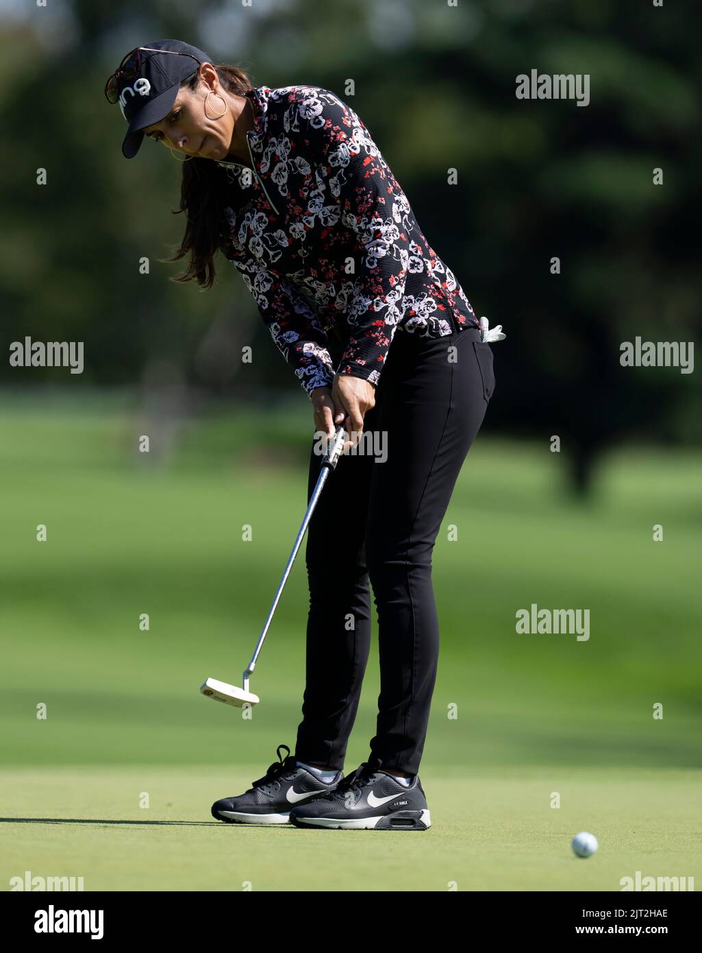 Paula Reto, from South Africa, putts for a birdie on the fourth hole ...