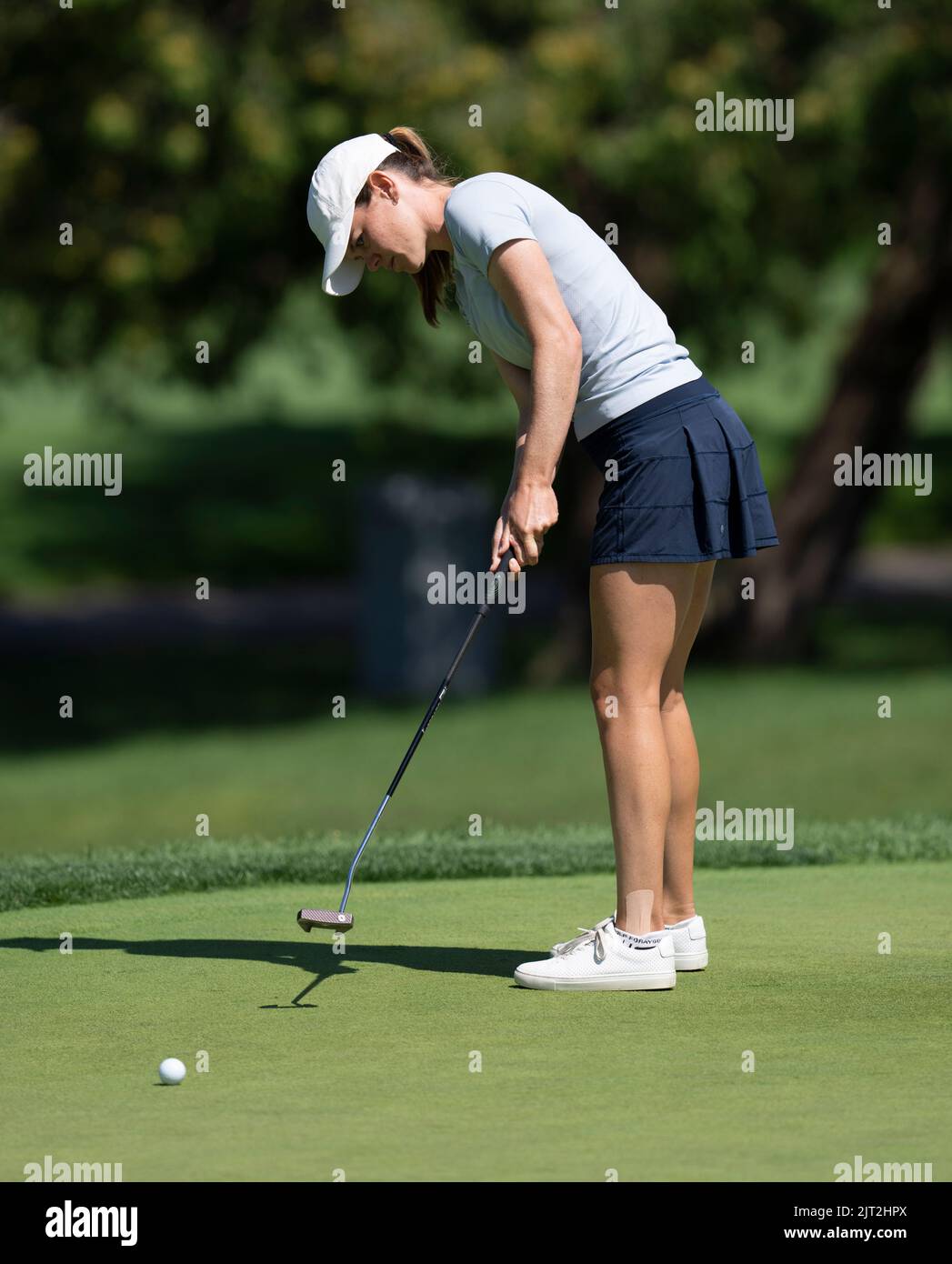 Sarah Schmelzel, from the United States, attempts a putt on the 4th ...