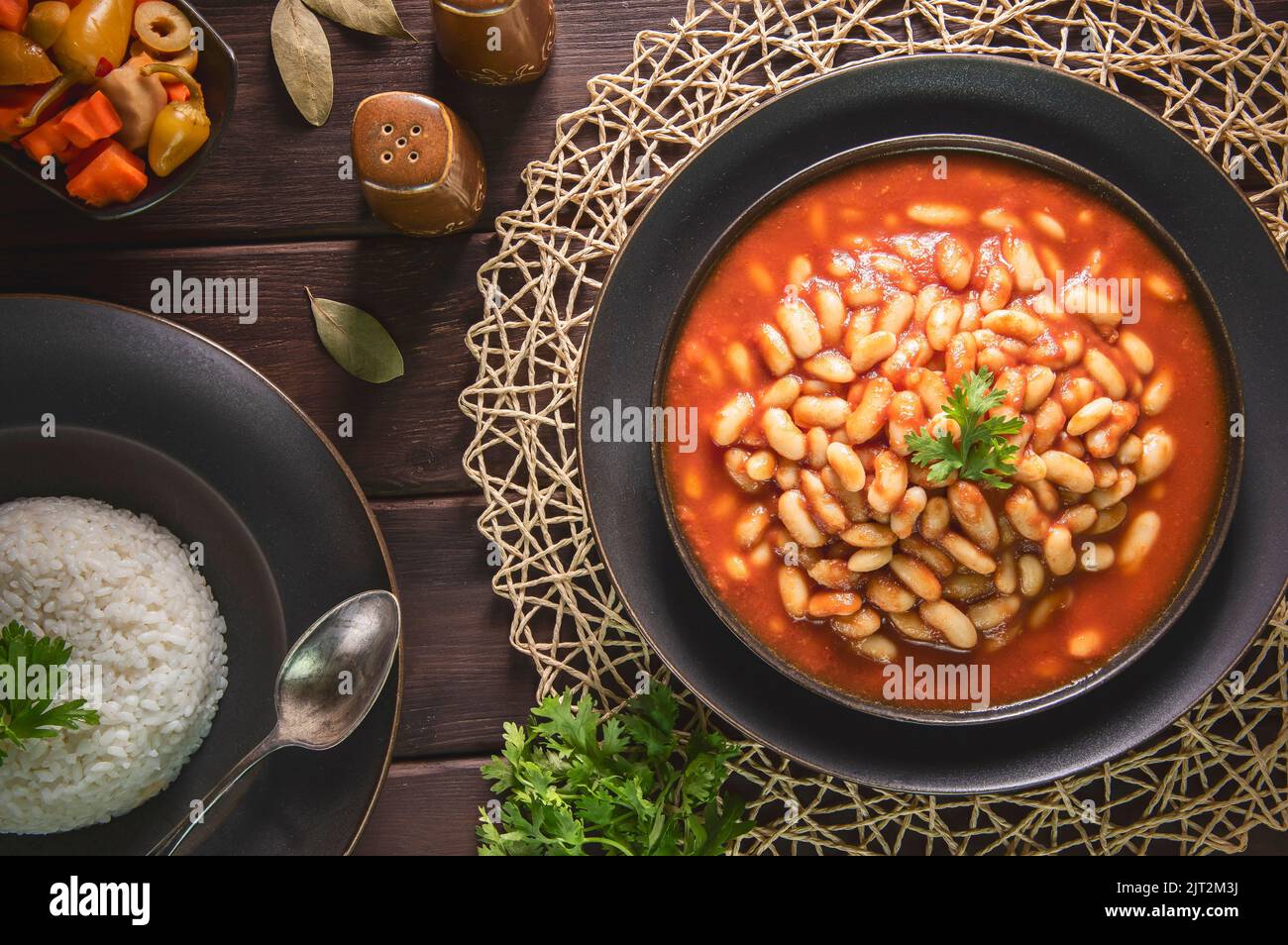 Arabic Cuisine; Middle Eastern traditional white beans in tomato sauce ...