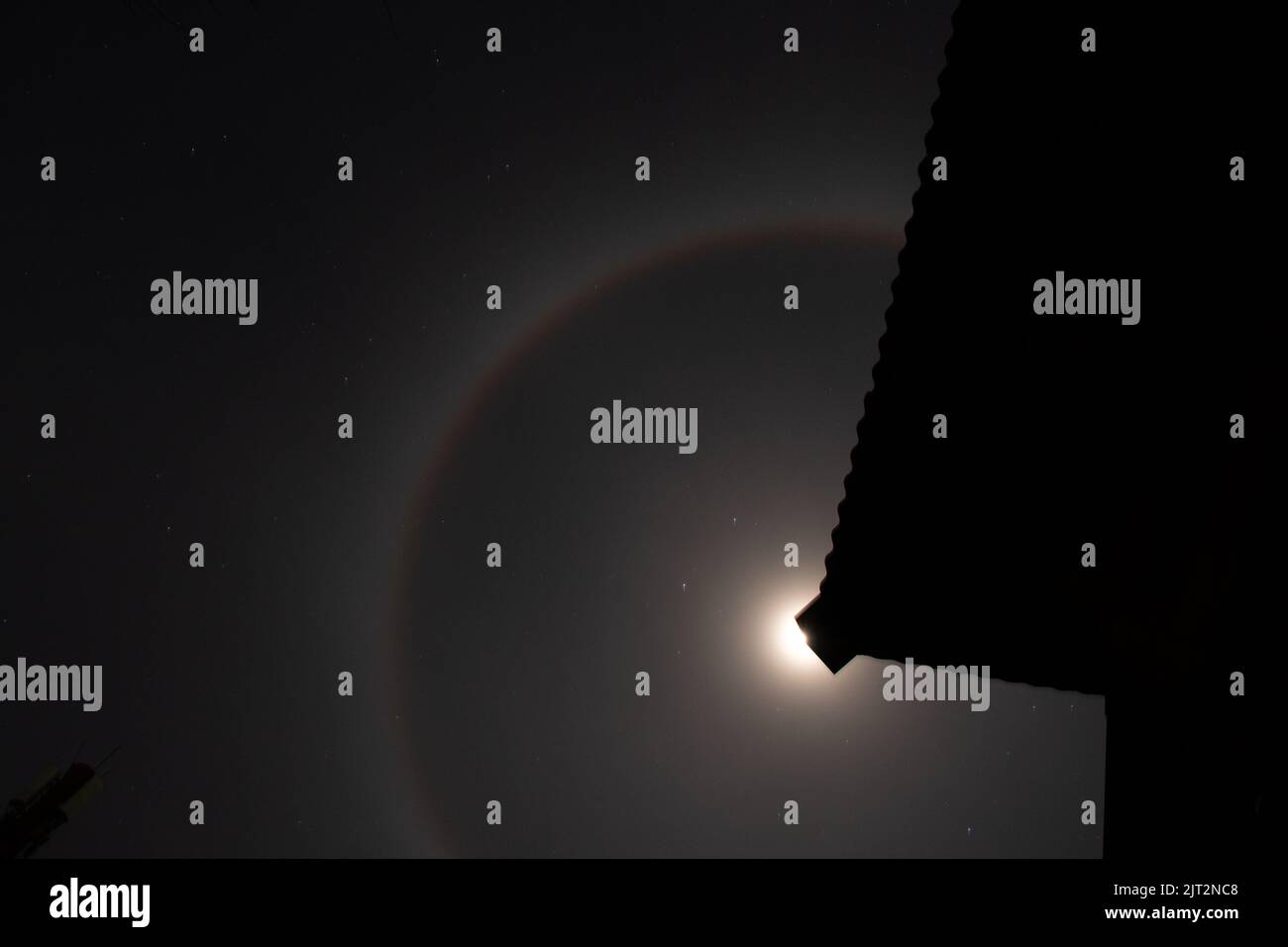 Halo phenomenon on the moon over Ukraine at night during the war in the ...