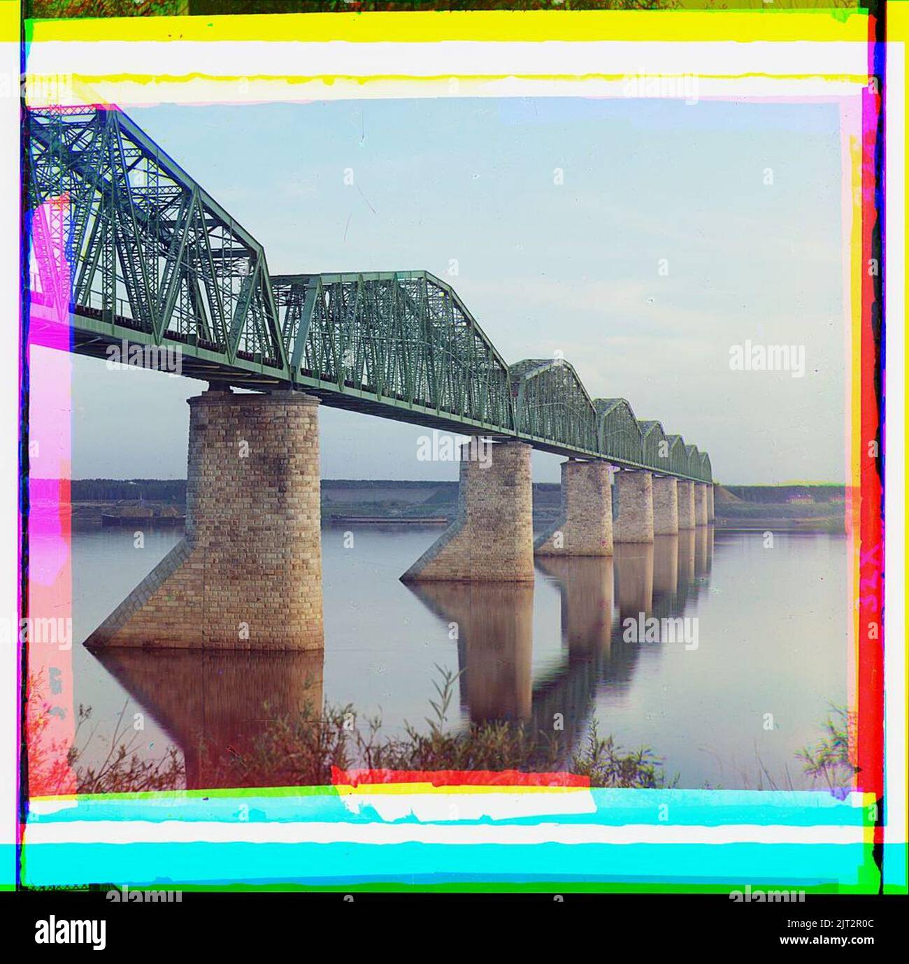 Trans-Siberian Railway metal truss bridge on stone piers, over the Kama ...