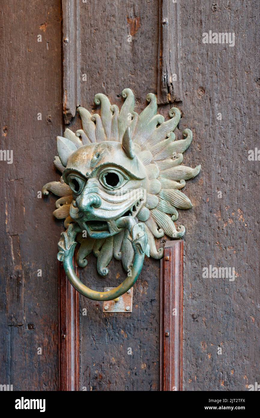 old ghoul or devil metal door knocker in norman cathedral in Durham ...