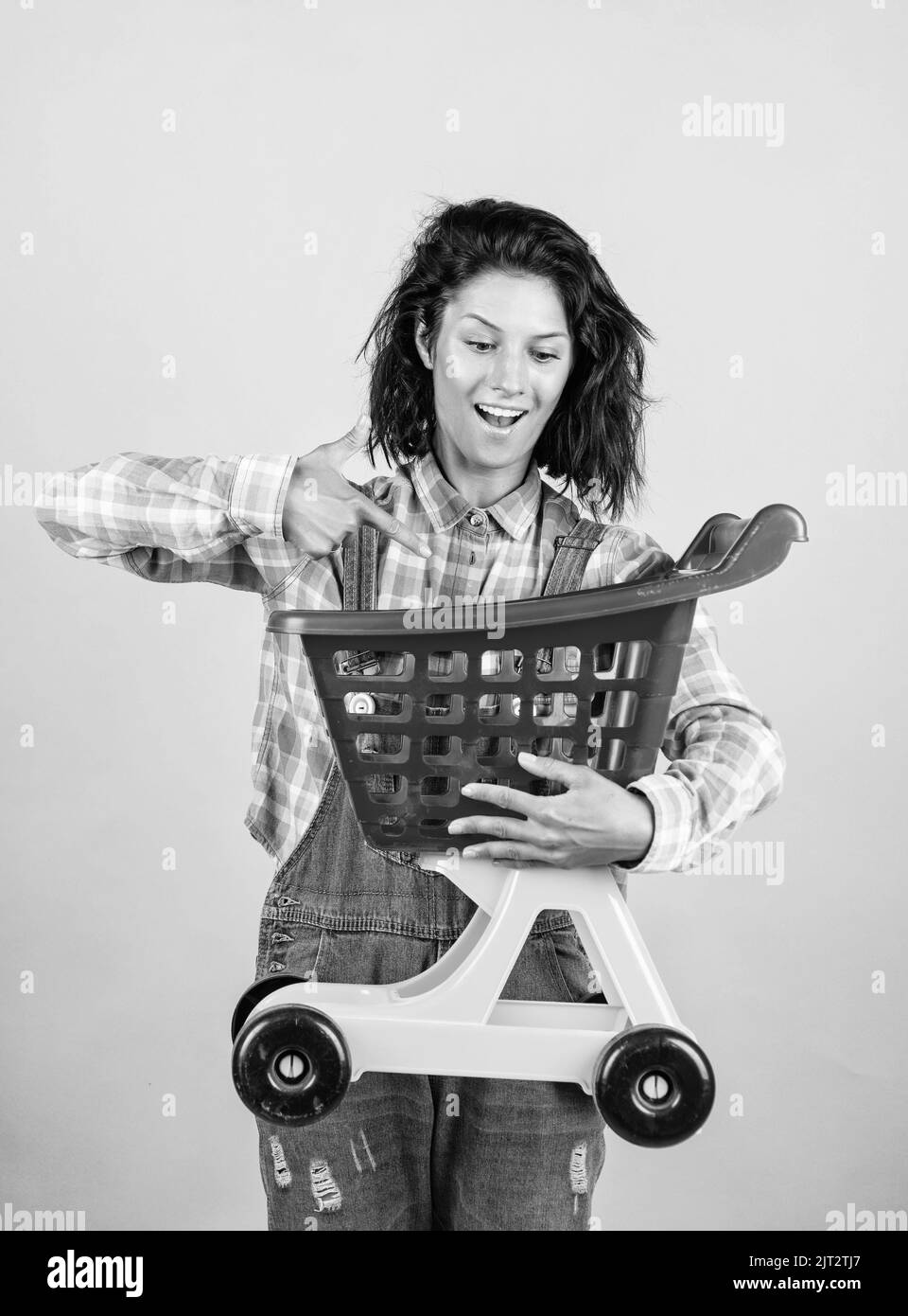 Lady with shopping trolley Black and White Stock Photos & Images - Alamy