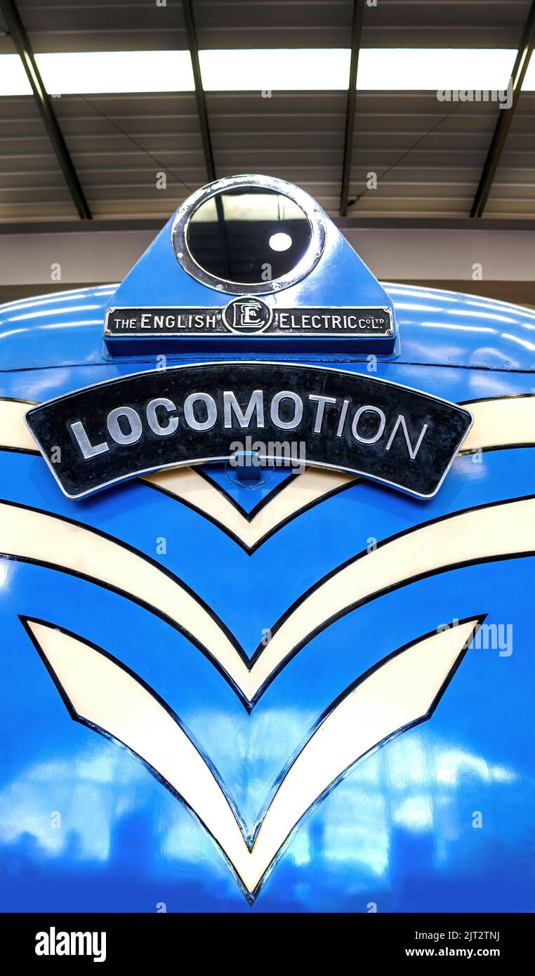 closeup front view of Blue locomotion train at North East Land Sea ...