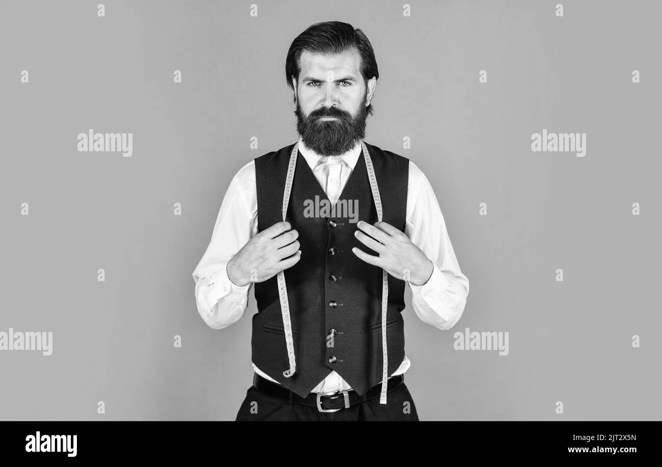 formal and office style. man tailor with tape measure. man tailoring ...