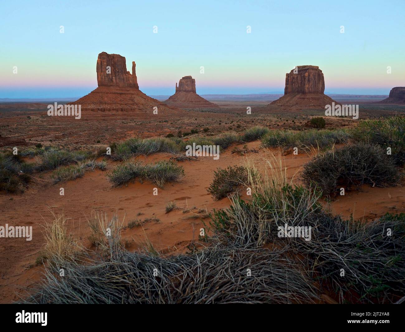 A breathtaking sunset over the monument valley and its iconic rocks ...