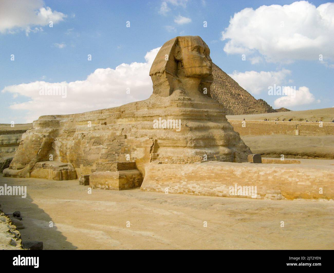 The Sphinx statue with the Pyramid of Giza in the background Stock ...