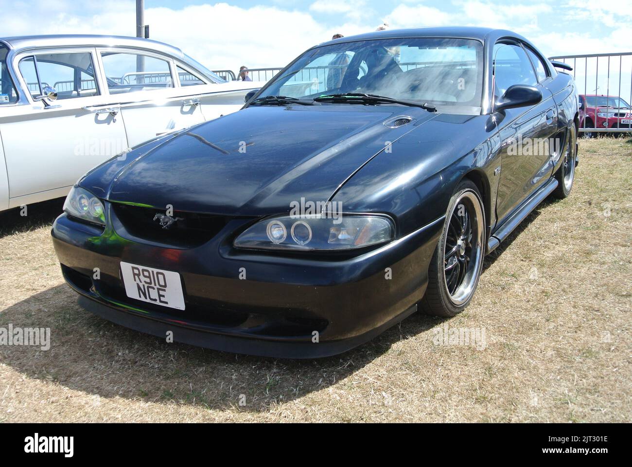 A 1998 Ford Mustang GT parked on display at the English Riviera classic ...