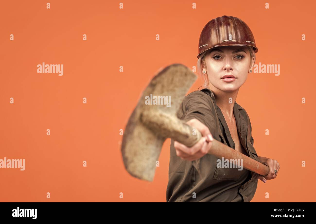 working woman. female builder hold shovel. building and construction ...