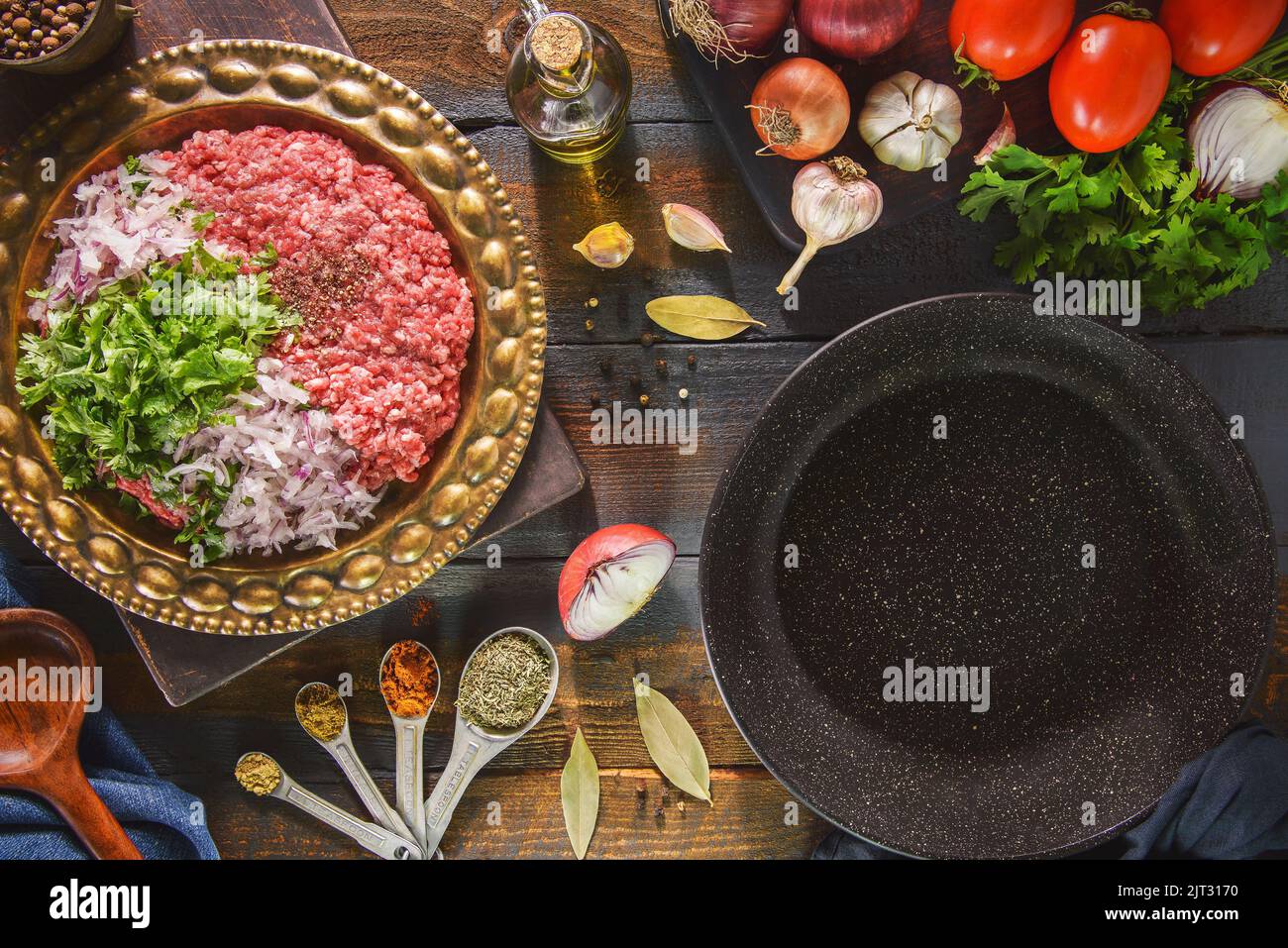 Preparation for delicious Middle Eastern recipe. Ground meat with fresh ...