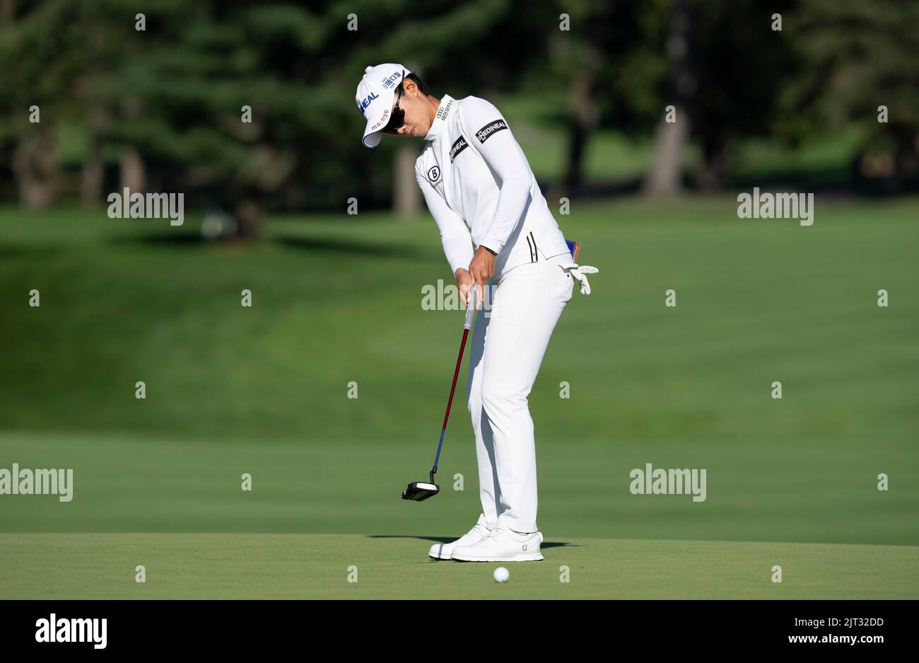 Na Rin An, from South Korea, attempts a putt on the 18th hole during ...