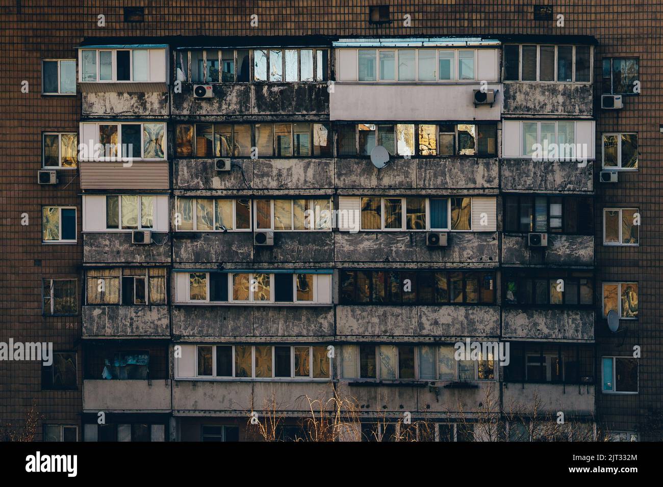 A facade of an old residential building Stock Photo - Alamy
