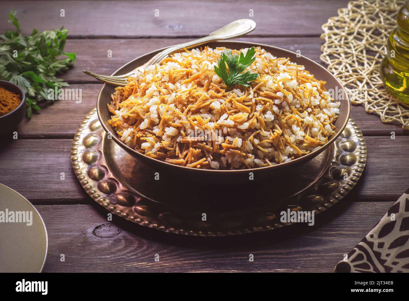 Arabic cuisine; Egyptian oriental dish "Rice with vermicelli" placed on ...