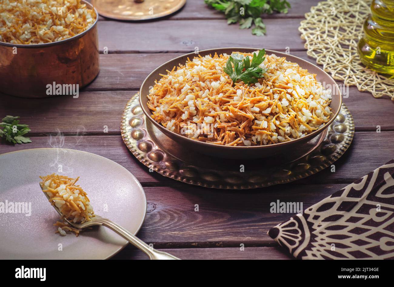 Arabic cuisine; Egyptian oriental dish "Rice with vermicelli" placed on ...