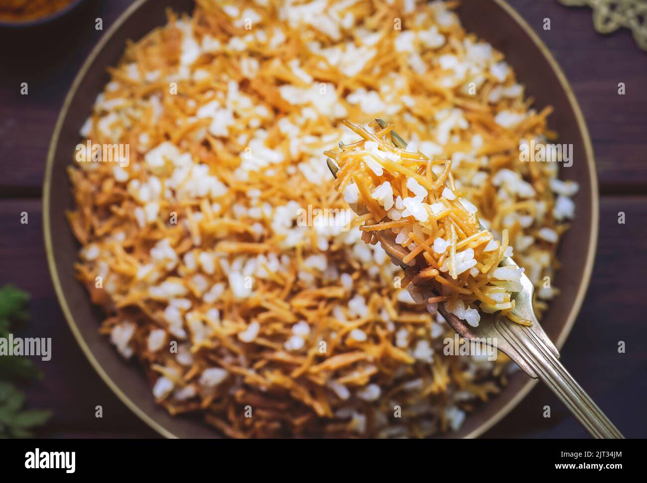 Arabic cuisine; Egyptian oriental dish "Rice with vermicelli" placed on ...